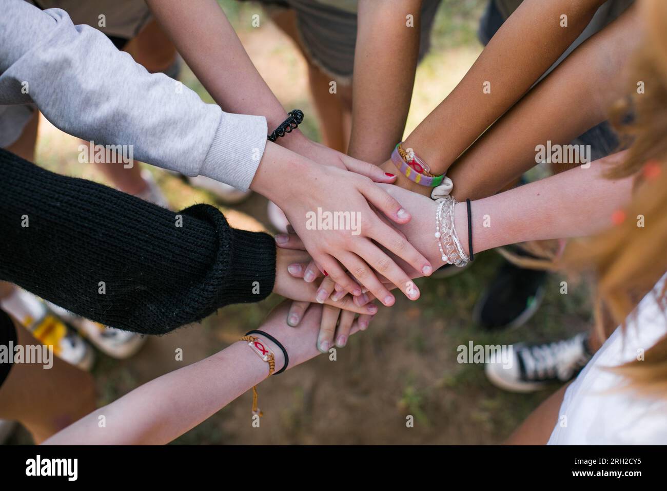 Team of children put hands together.Peaceful Protest kids group and ...