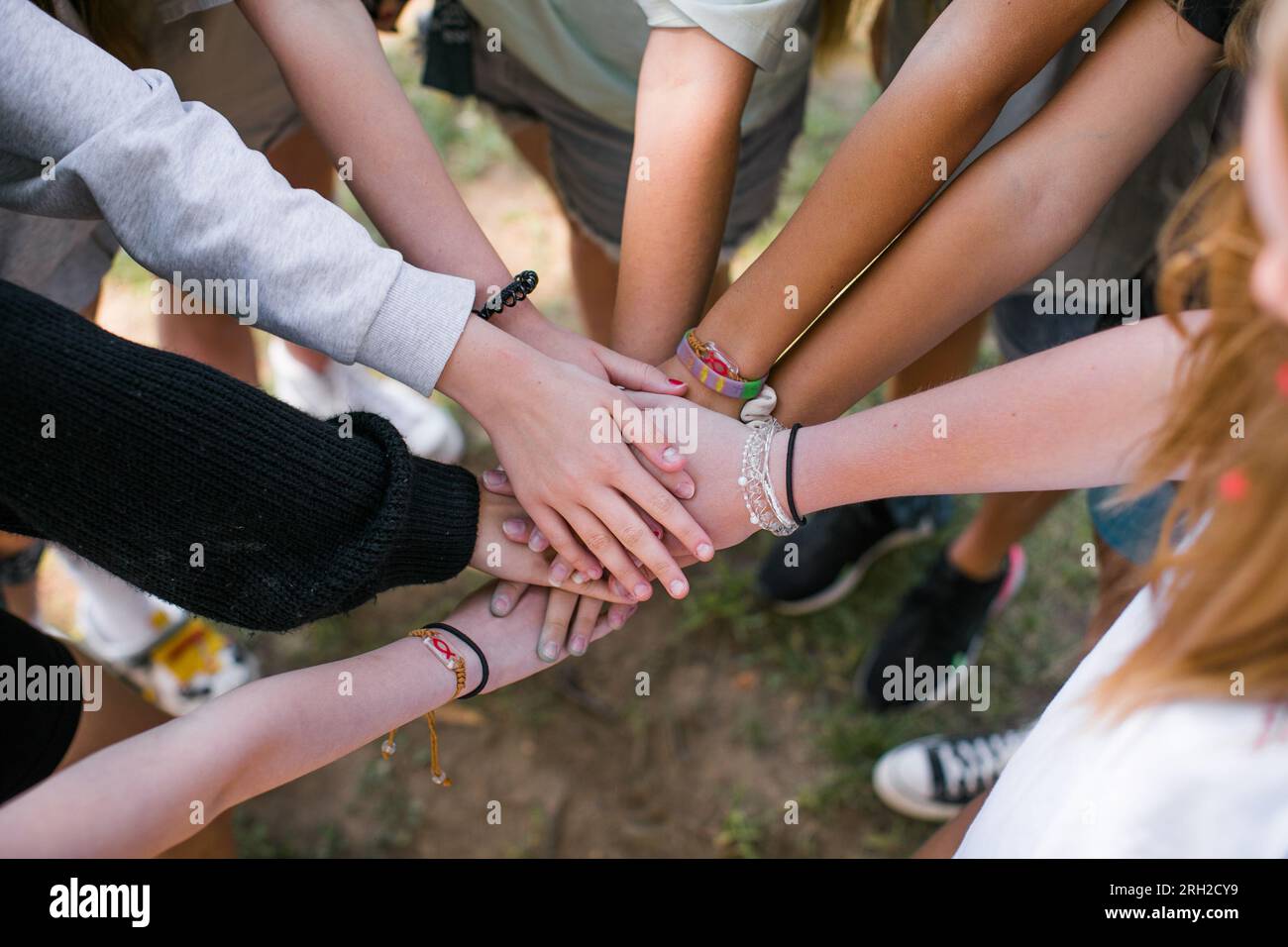 Team of children put hands together.Peaceful Protest kids group and ...