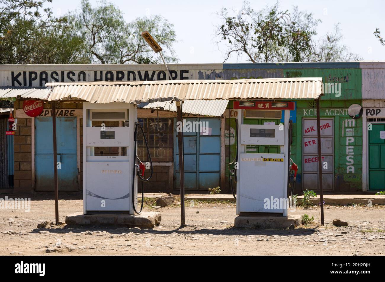 Two fuel pumps in front of small shops, Nakuru, Kenya Stock Photo - Alamy