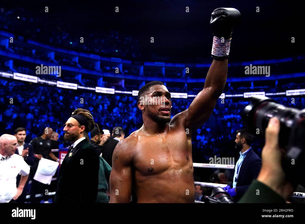 Anthony Joshua celebrates victory via knock out against Robert Helenius ...