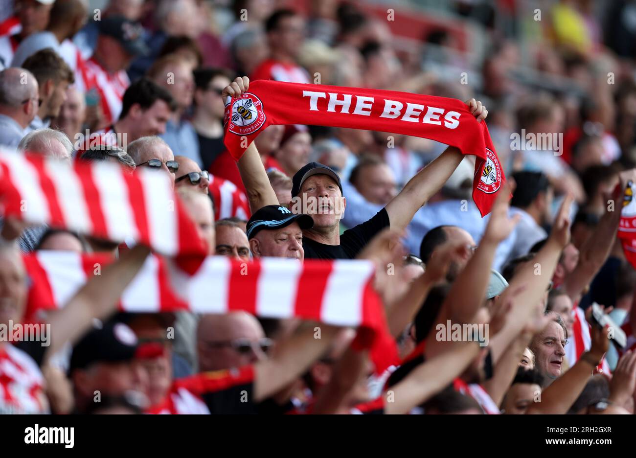 Brentford fans show their support prior to the Premier League match at ...