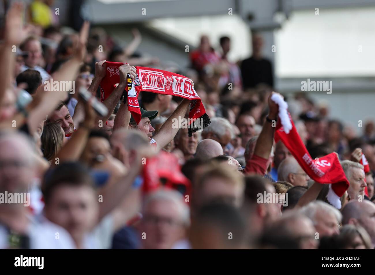 Brentford fans hold up their scarfs during the Premier League match ...
