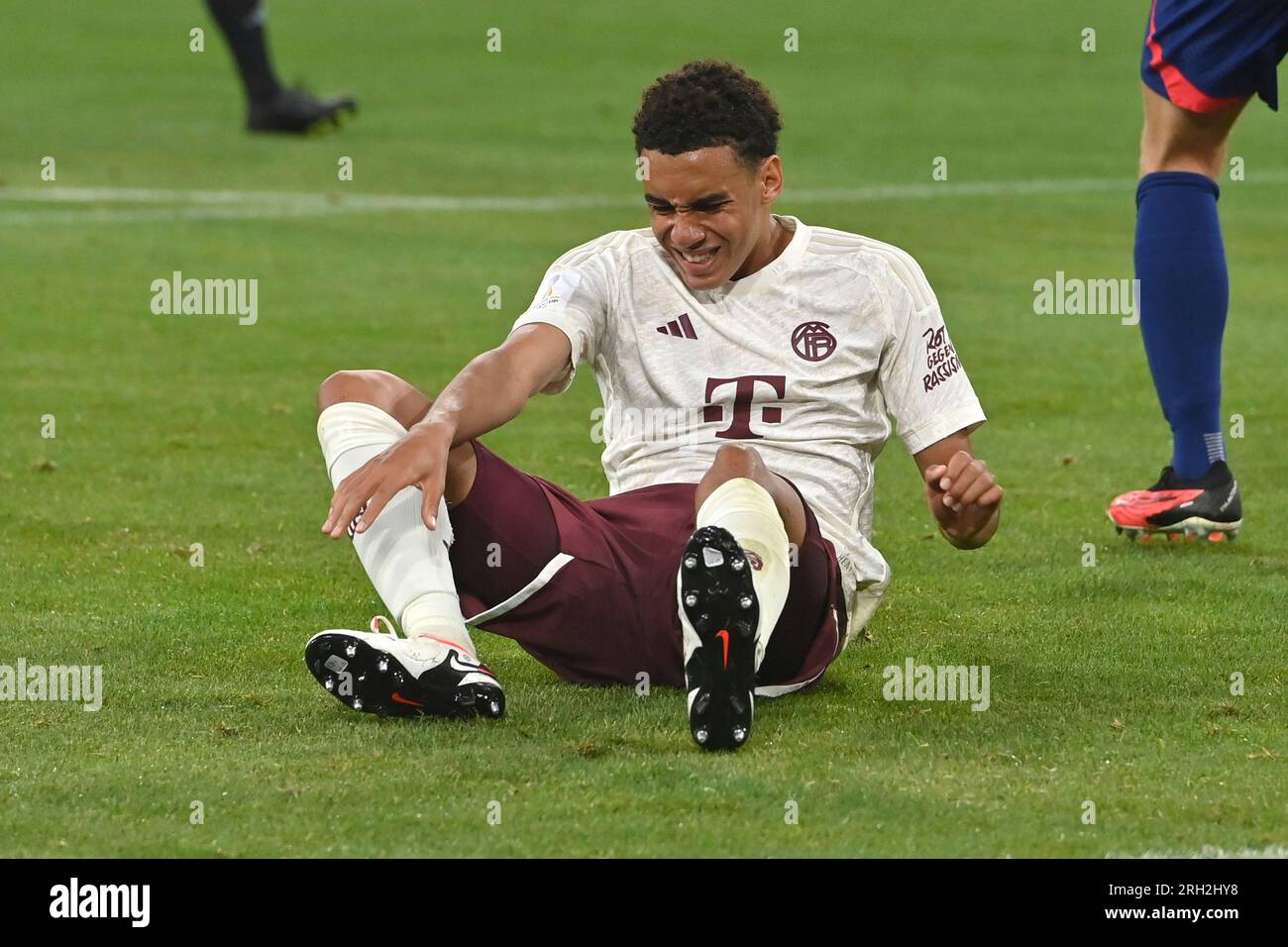 Jamal MUSIALA (FC Bayern Munich) with pain on the ground, injured, injury. Action, single action ...