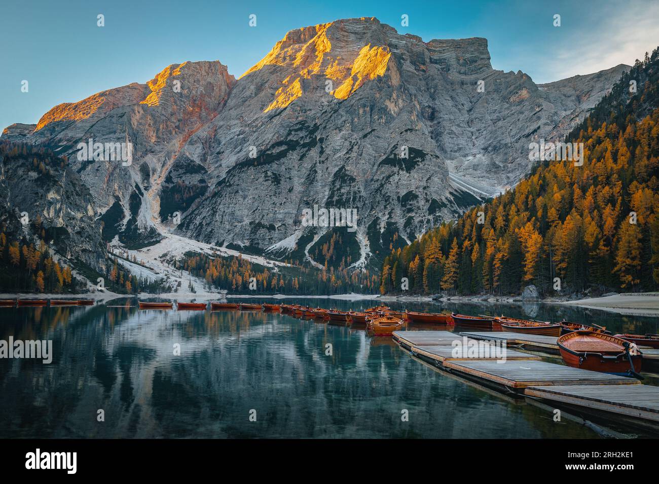 Anchored rowing wooden boats on the lake Braies. Great travel ...