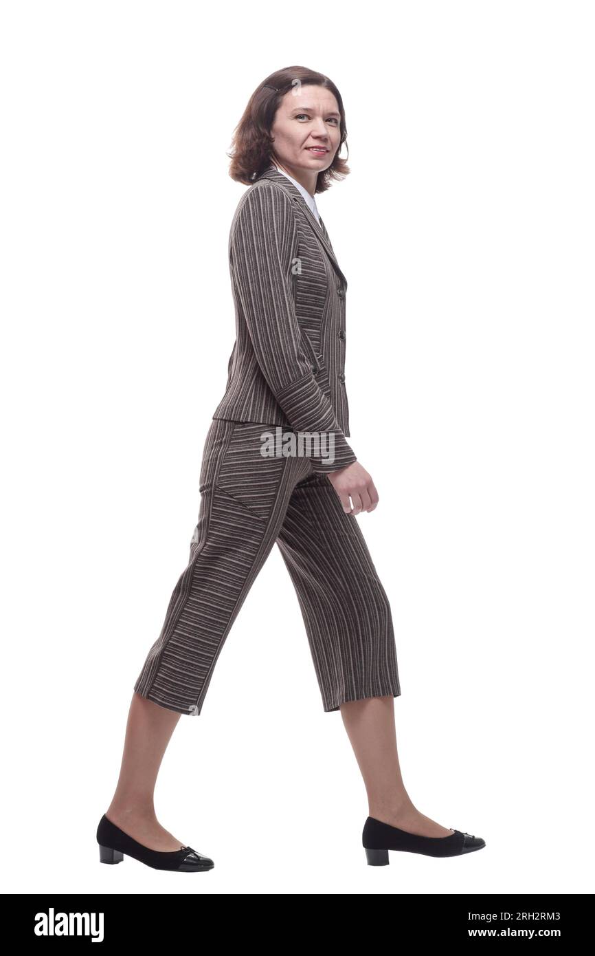 in full growth. modern business woman stepping forward. isolated on a ...