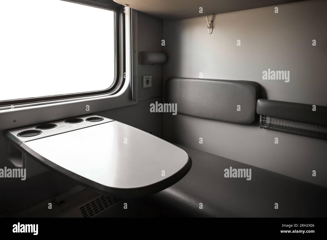 Interior of train compartment with table Stock Photo - Alamy