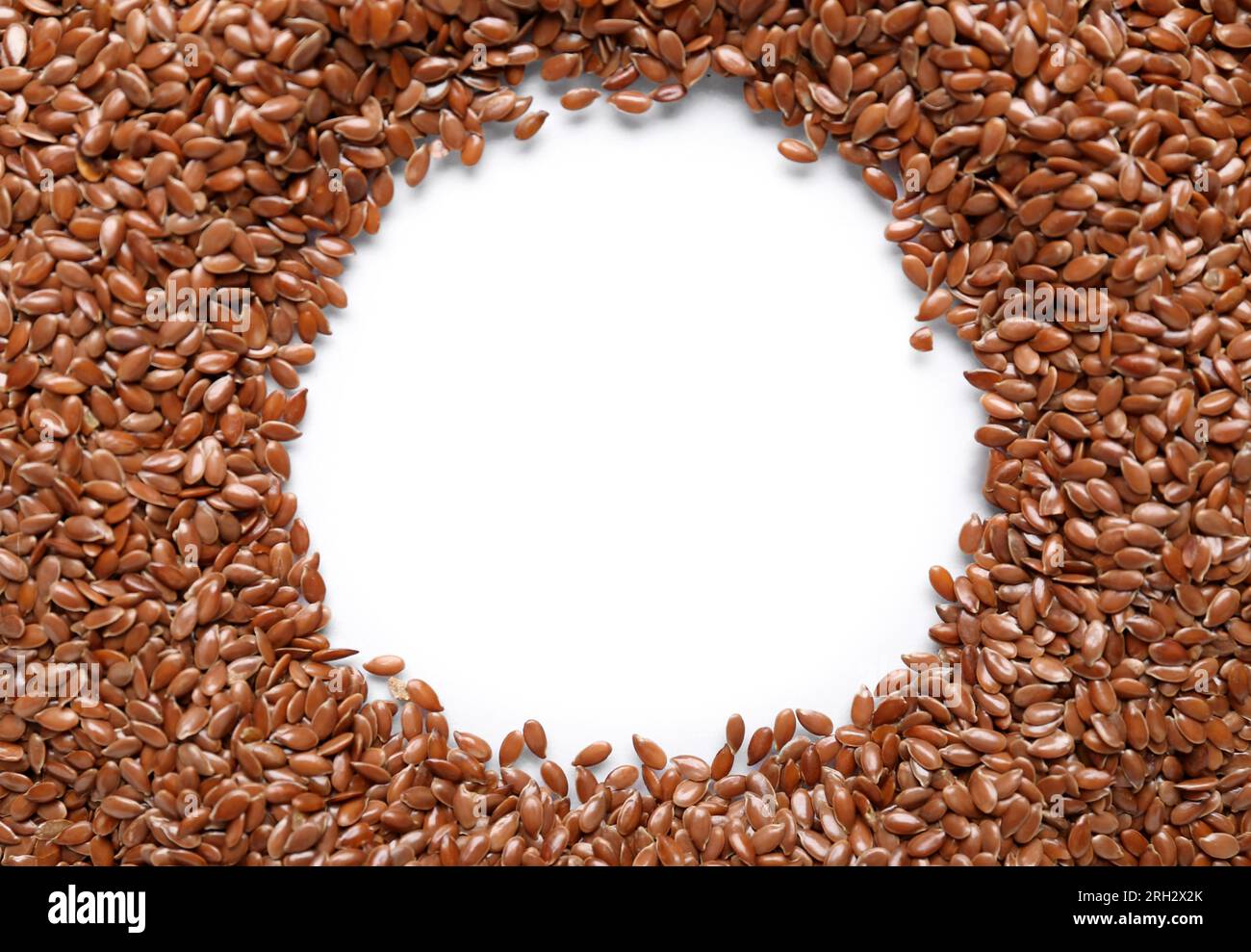 Frame made of flax seeds on white background Stock Photo - Alamy