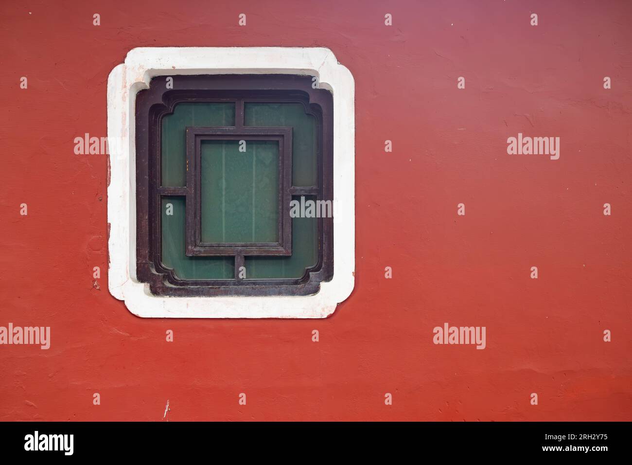 square shape window on a red wall Stock Photo - Alamy