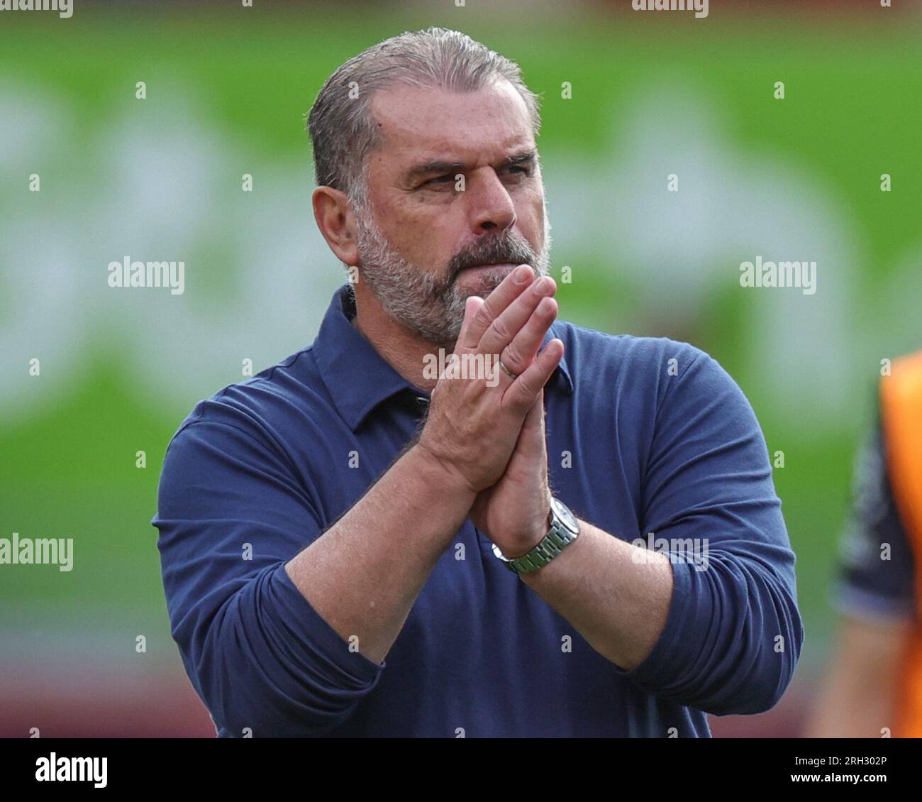 Ange Postecoglou head coach of Tottenham Hotspur applauds the away fans ...
