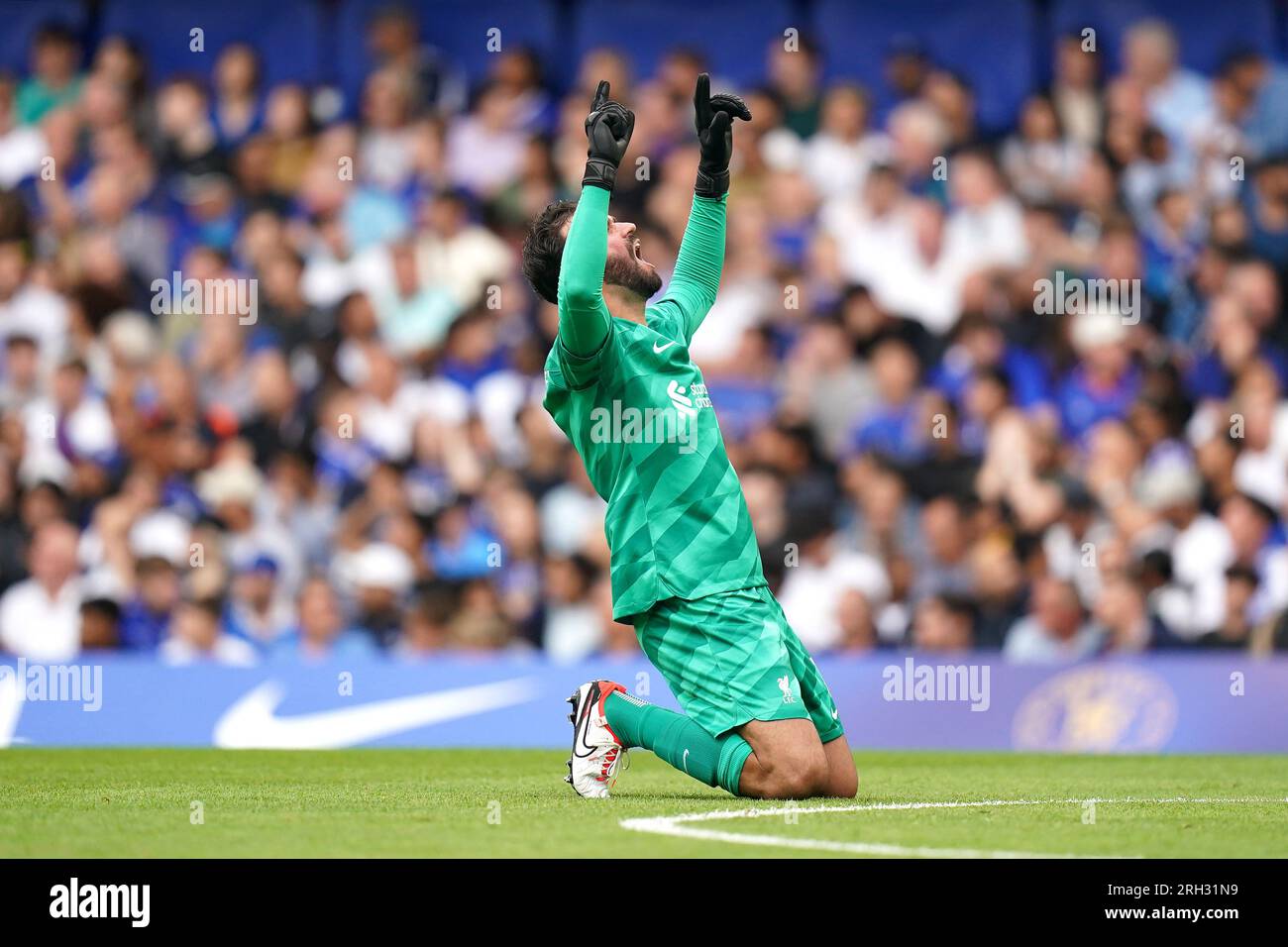 Liverpool goalkeeper Alisson Becker celebrates his side's first goal of ...