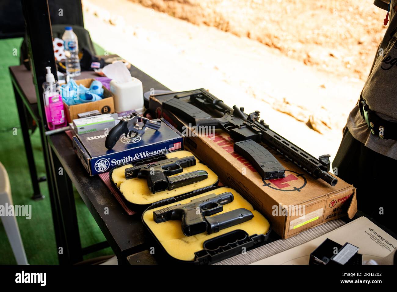 Various handguns seen displayed at a shooting range in Betong. Daily ...
