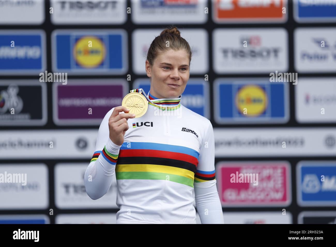 Belgium’s Lotte Kopecky celebrates winning the Women’s Elite Road Race ...