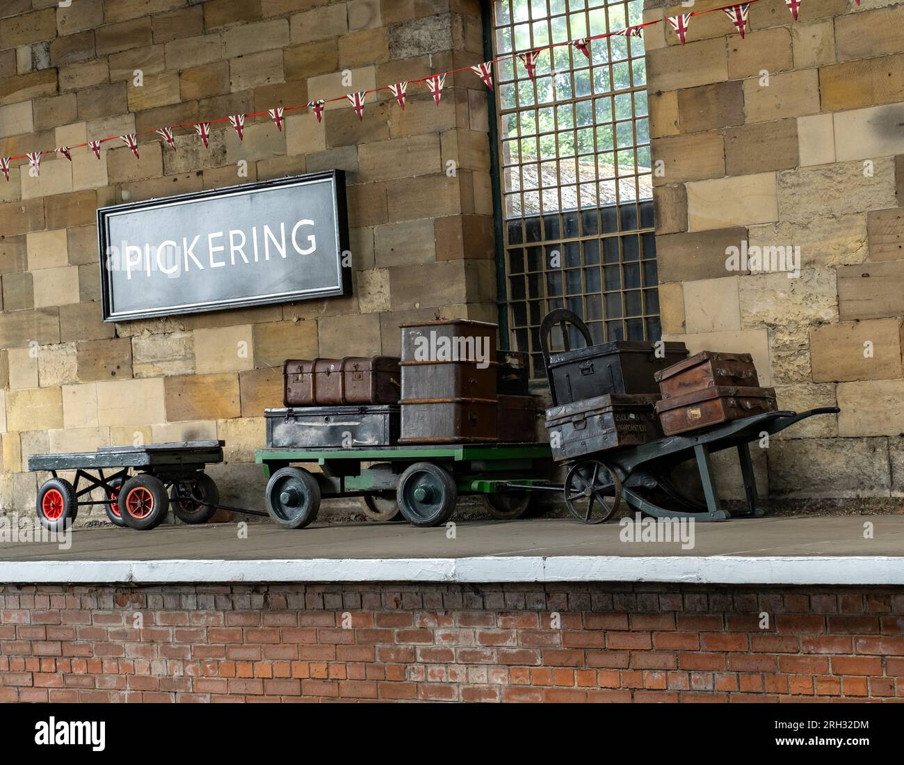 Vintage and retro luggage and trolley on the railway platform in the ...