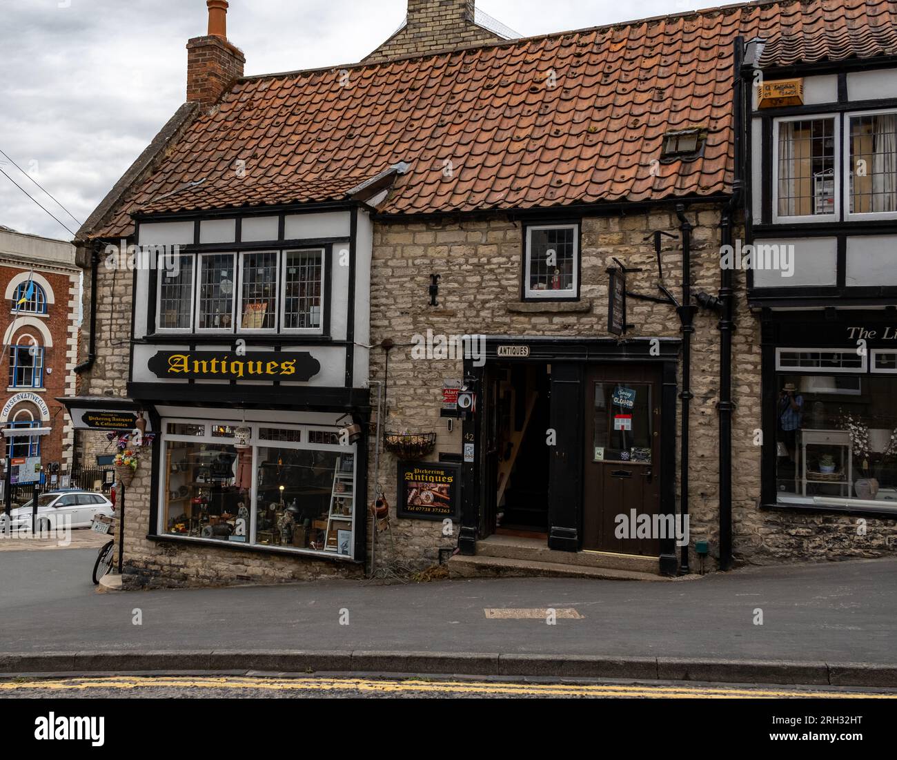 The exterior of a traditional antiques shop in the town of Pickering in ...