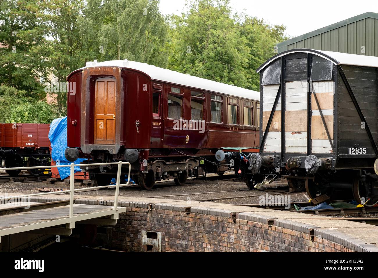 Traditional passenger carriages in a railway shunting yard Stock Photo ...
