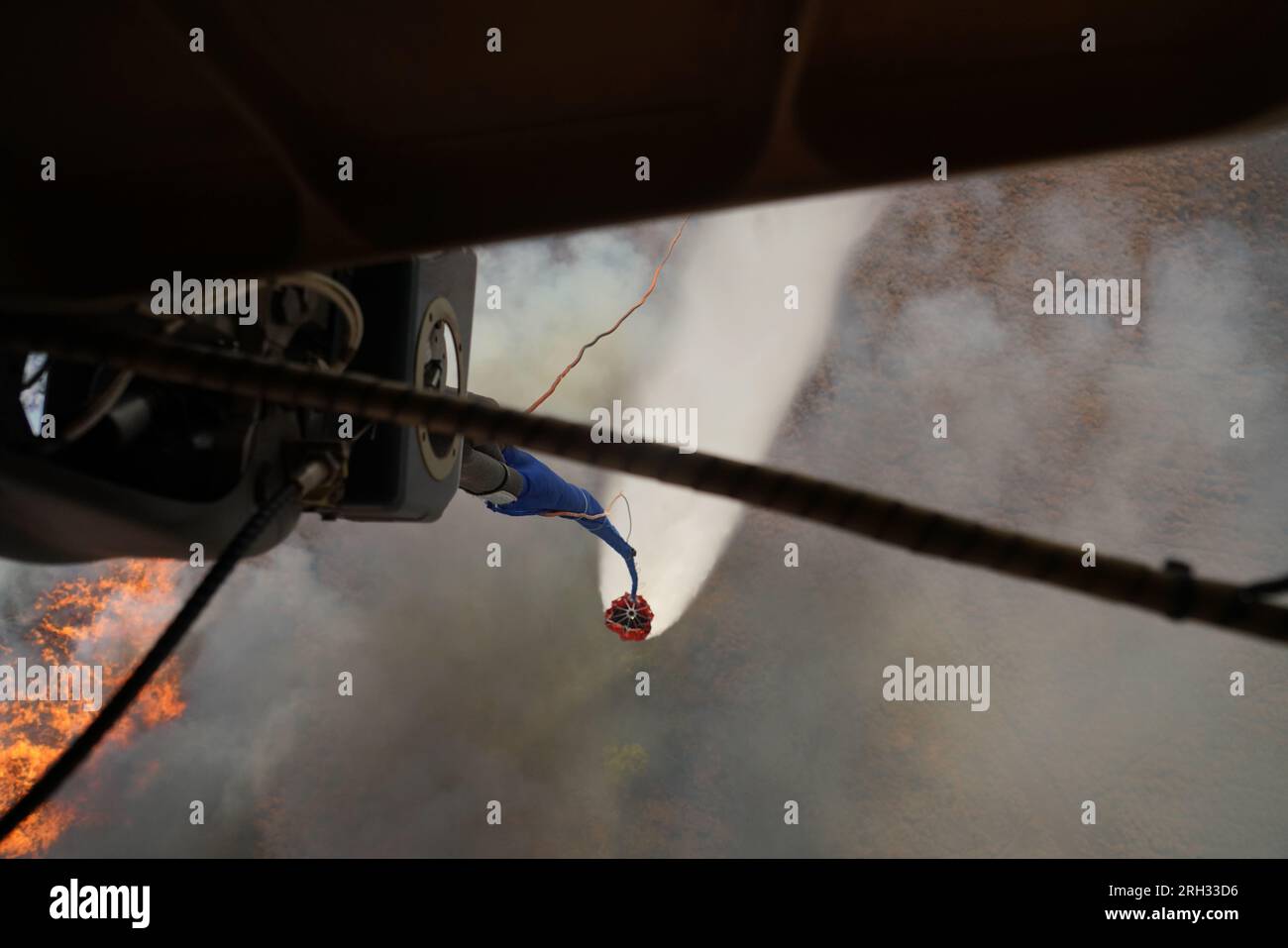 Two Hawaii Army National Guard CH47 Chinook perform aerial water bucket ...