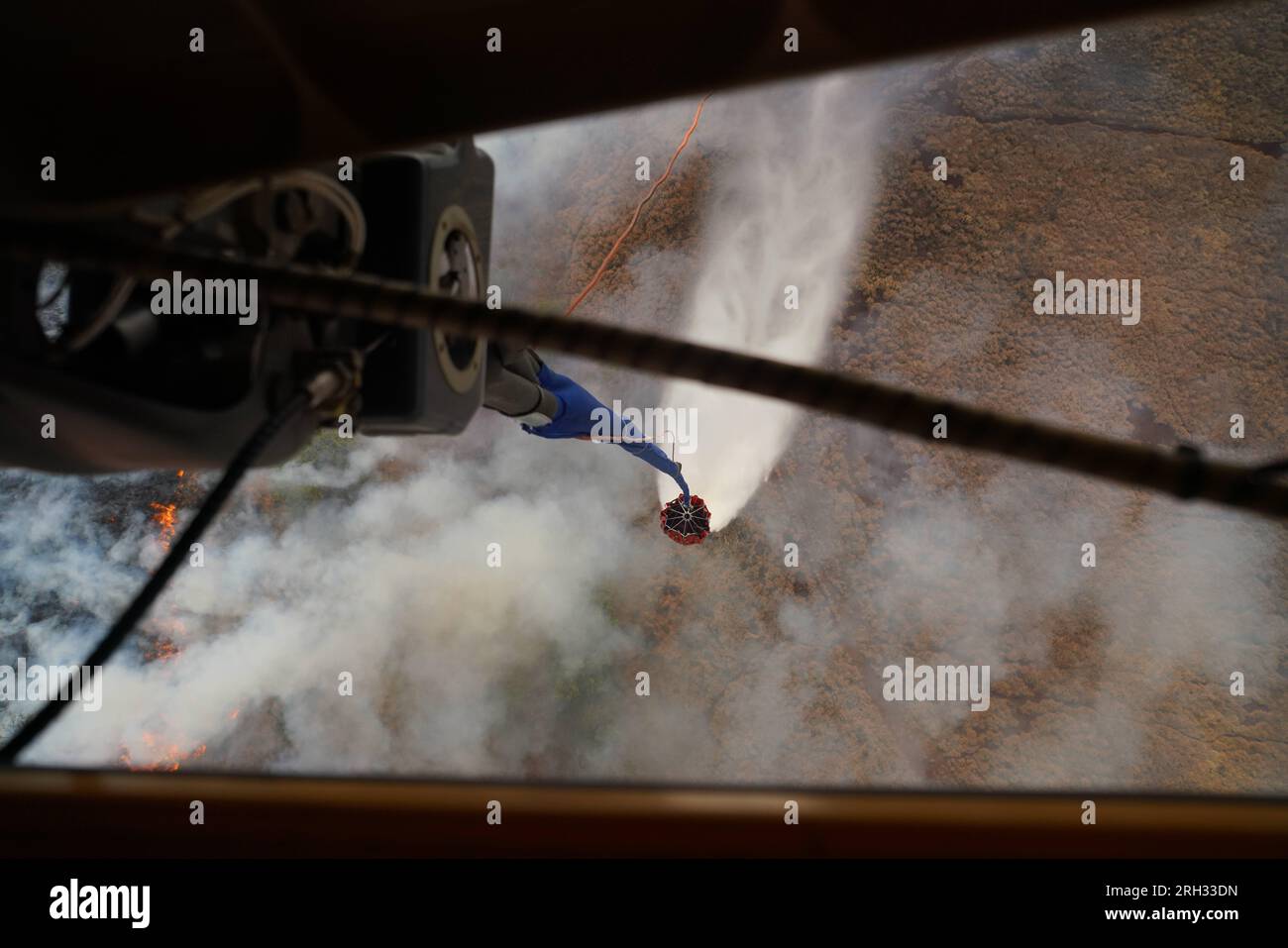 Two Hawaii Army National Guard CH47 Chinook perform aerial water bucket ...