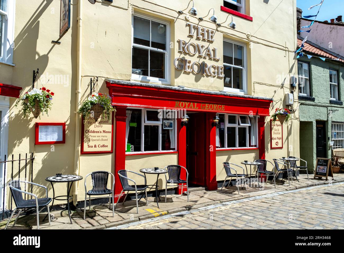 The exterior of the Royal George pub in the seaside village of Staithes ...