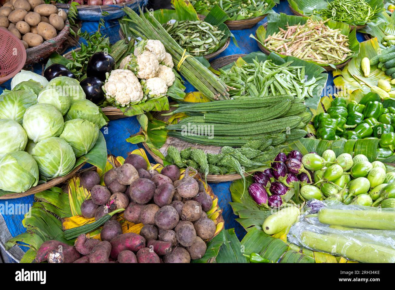 MUMBAI - SEPT 25: Street market with vegetables cabbages, cucumbers ...