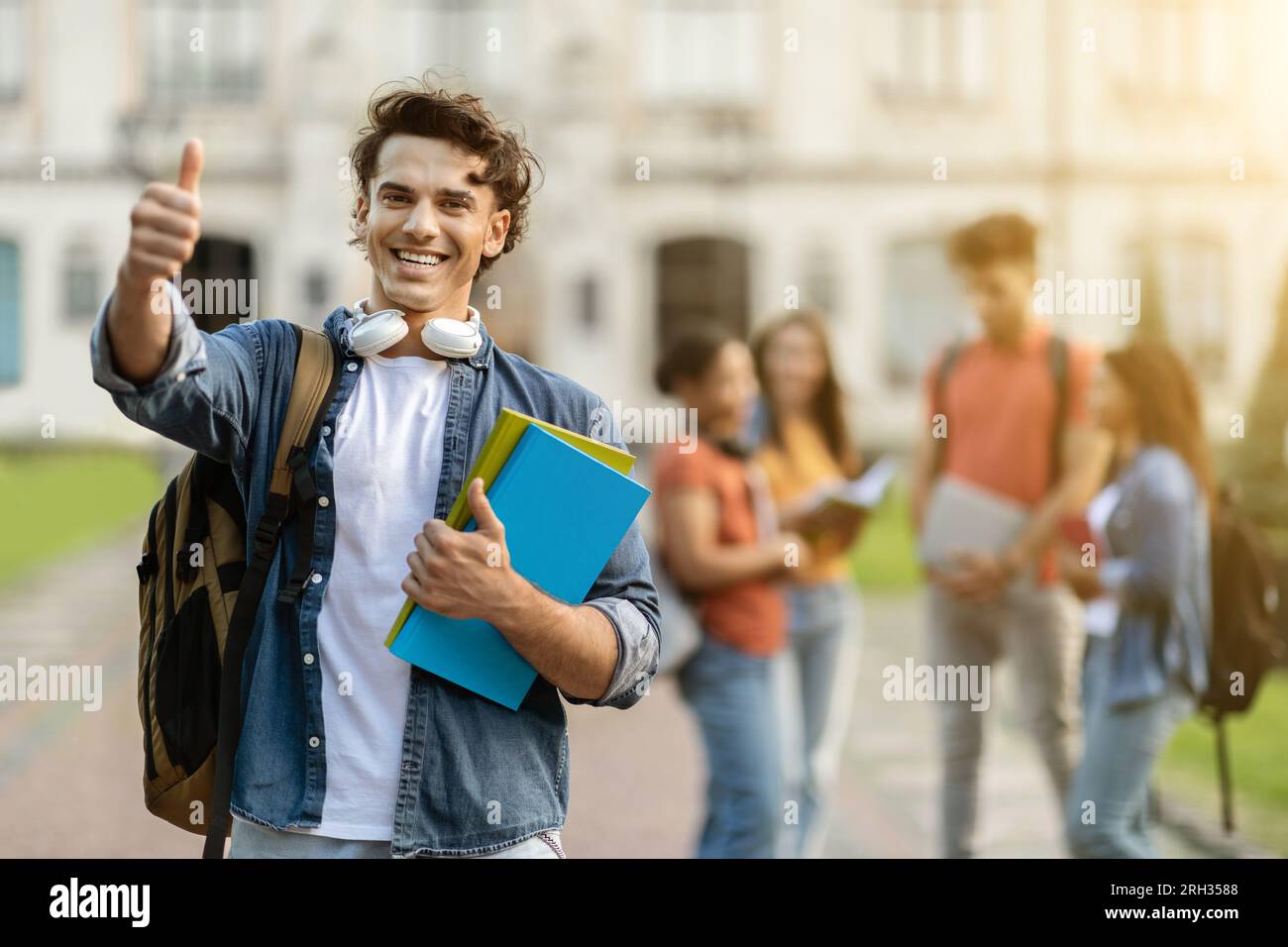 Smiling multicultural students showing hi-res stock photography and ...