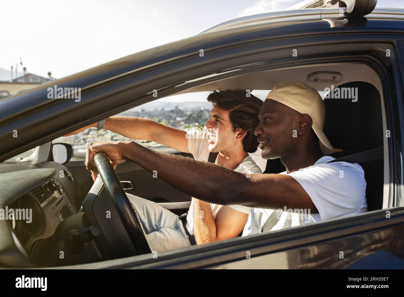 Two guys driving car hi-res stock photography and images - Alamy