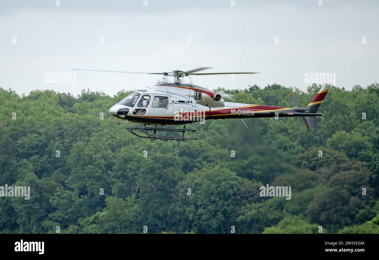Airbus AS355 N Helicopter M-OWEN in circuit at Cotswold Airport Stock ...