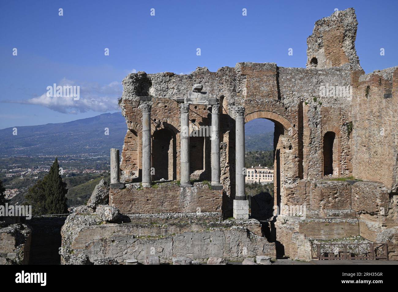 Landscape with scenic view of Taormina as seen from the Greco Romano ...