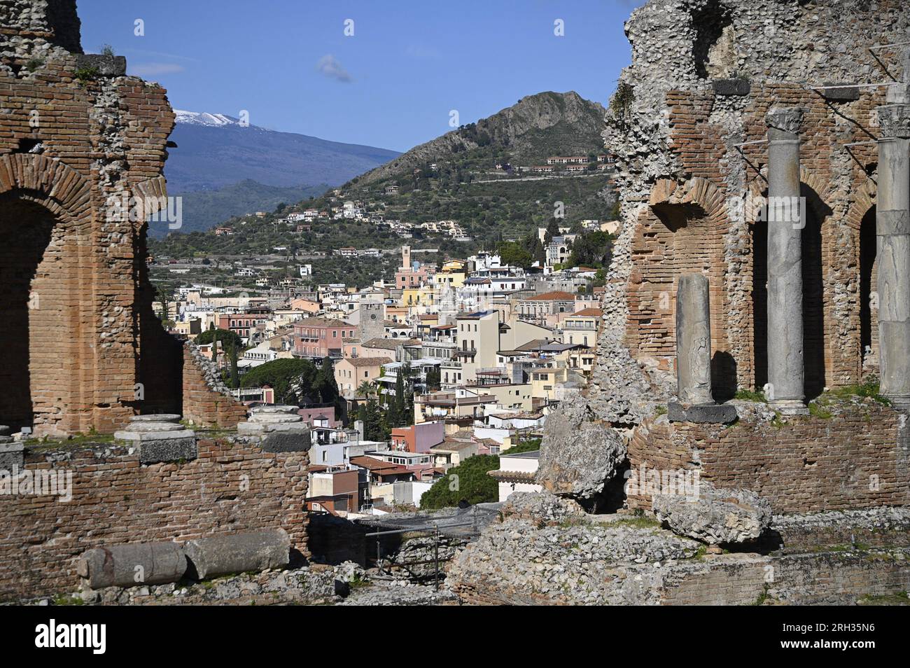 Landscape with scenic view of Taormina as seen from the Greco Romano ...