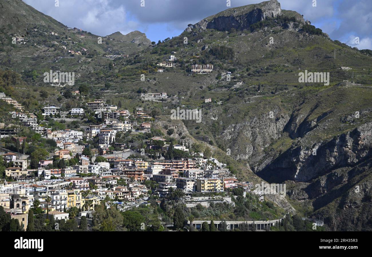 Landscape with scenic view of the East part of Taormina as seen from ...