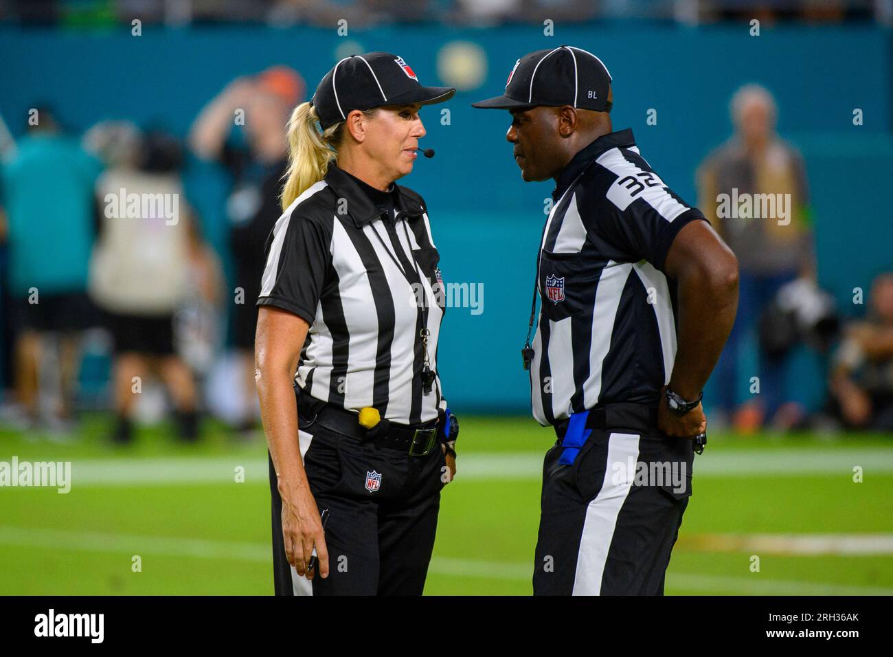 NFL down judge Sarah Thomas and line judge Walter Flowers talk on the ...