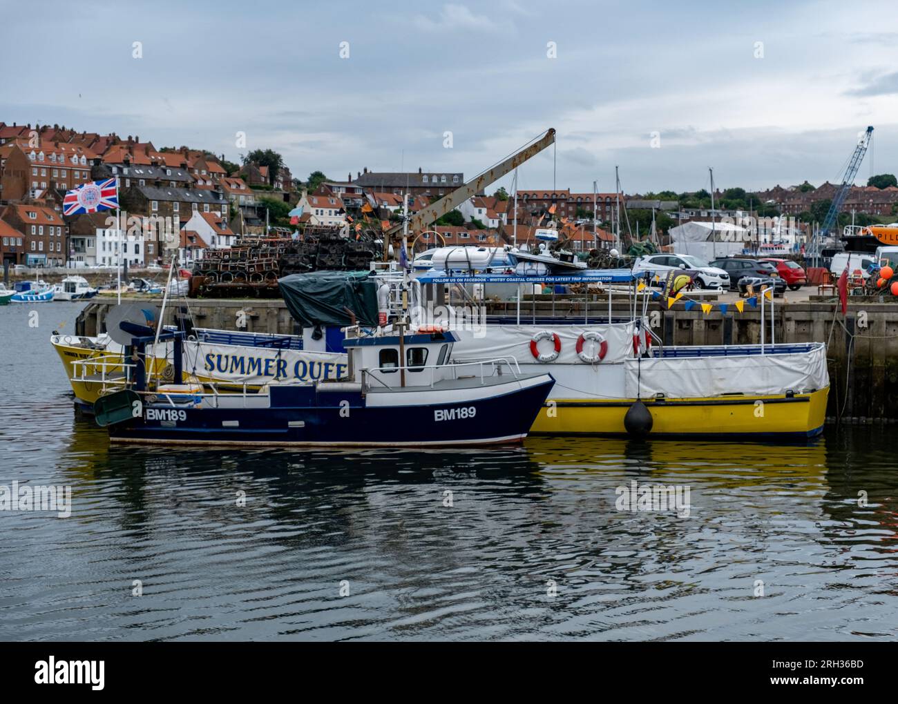 Commercial fishing boats and equipment in Whitby harbour on the North ...