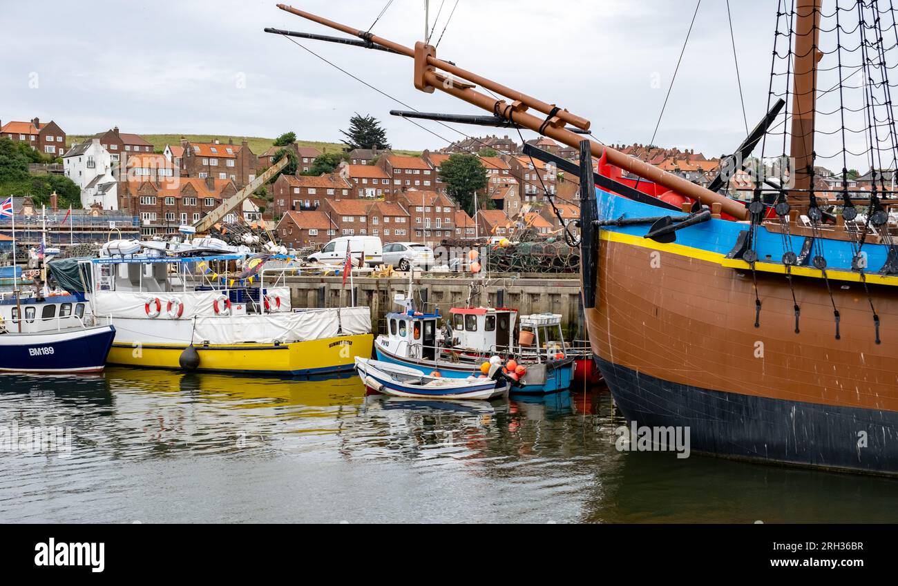 Commercial fishing boats and equipment in Whitby harbour on the North ...