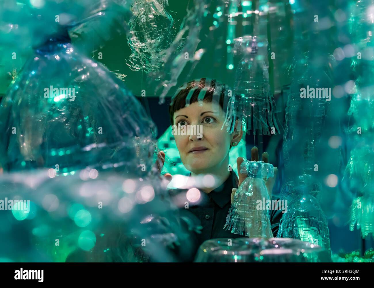 Dr Ali Clark curator of exhibition Rising Tide with plastic art ...