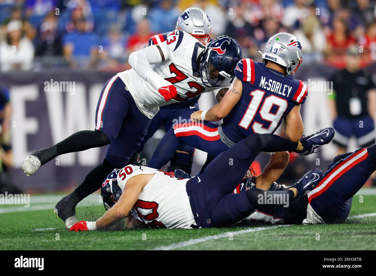 New England Patriots quarterback Trace McSorley (19) is sacked by ...