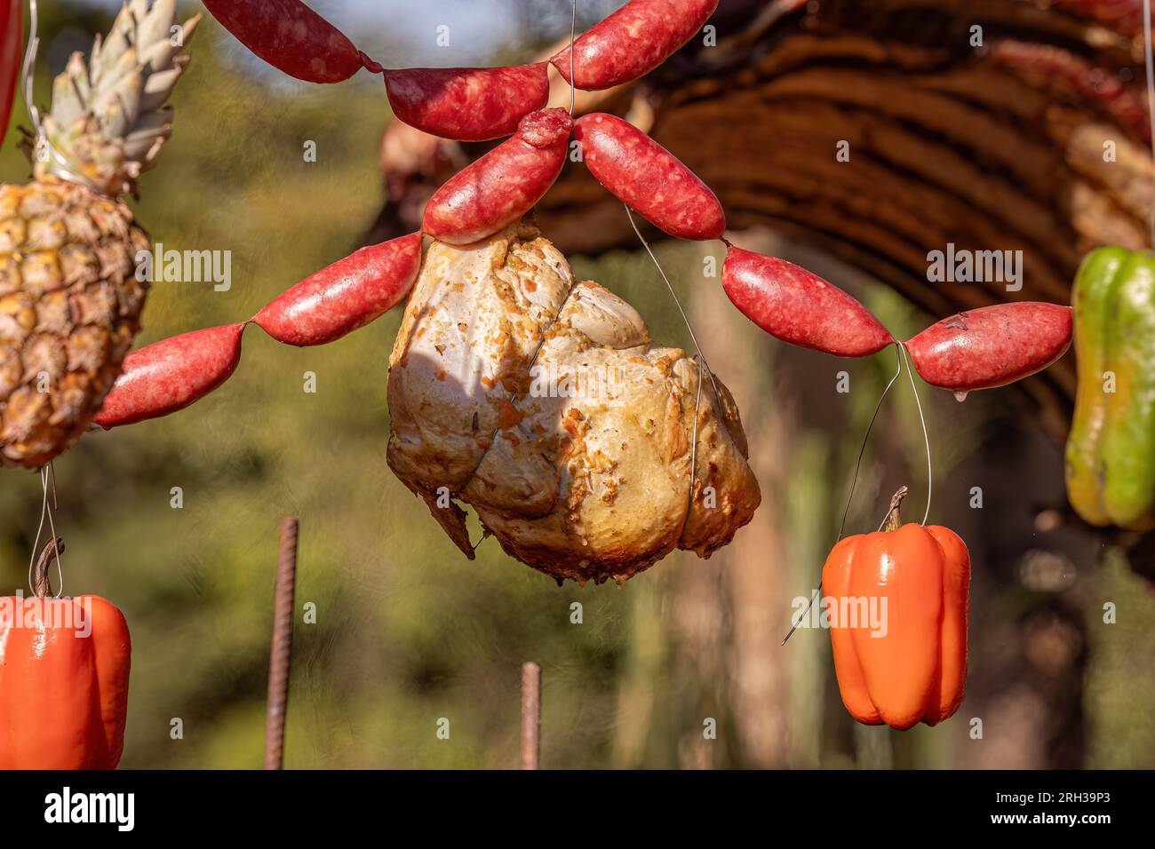 Hanging roast chicken hi-res stock photography and images - Alamy
