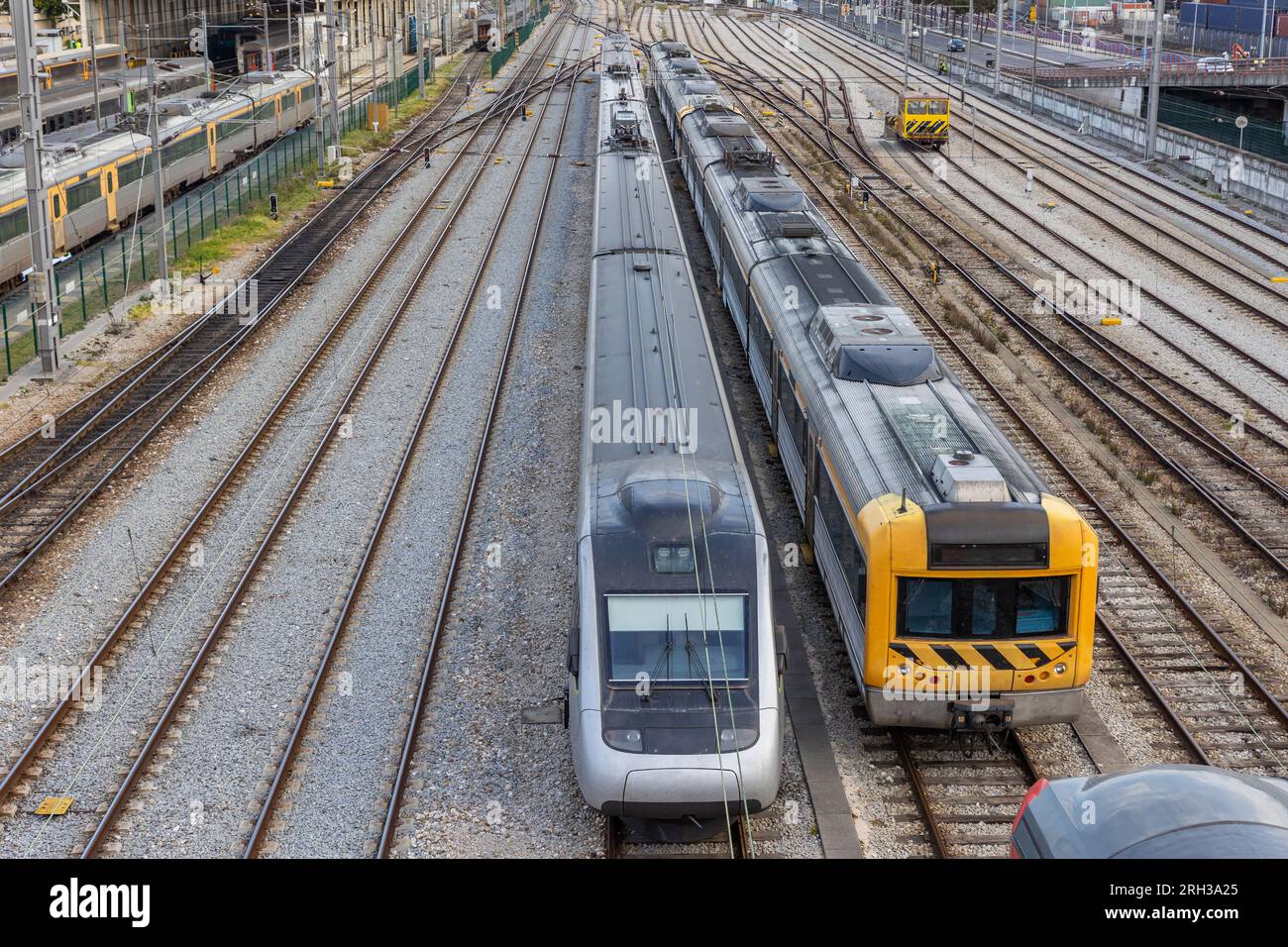 Old and modern trains stand on the rails at the railway depot. Aerial ...