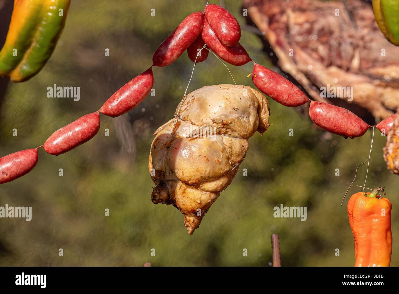 Hanging roast chicken hi-res stock photography and images - Alamy