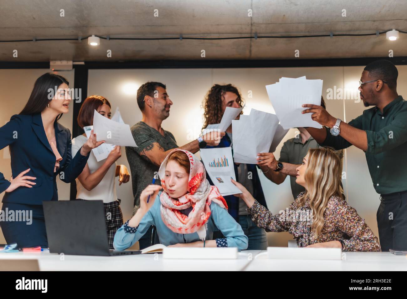 Diverse start-up business team blaming each other about the project ...