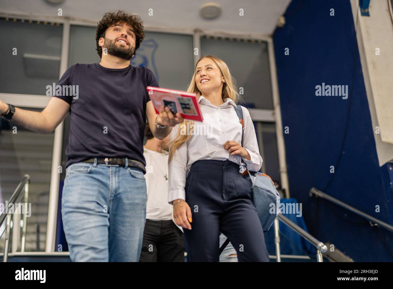 Students getting out of college after classes and having fun ...