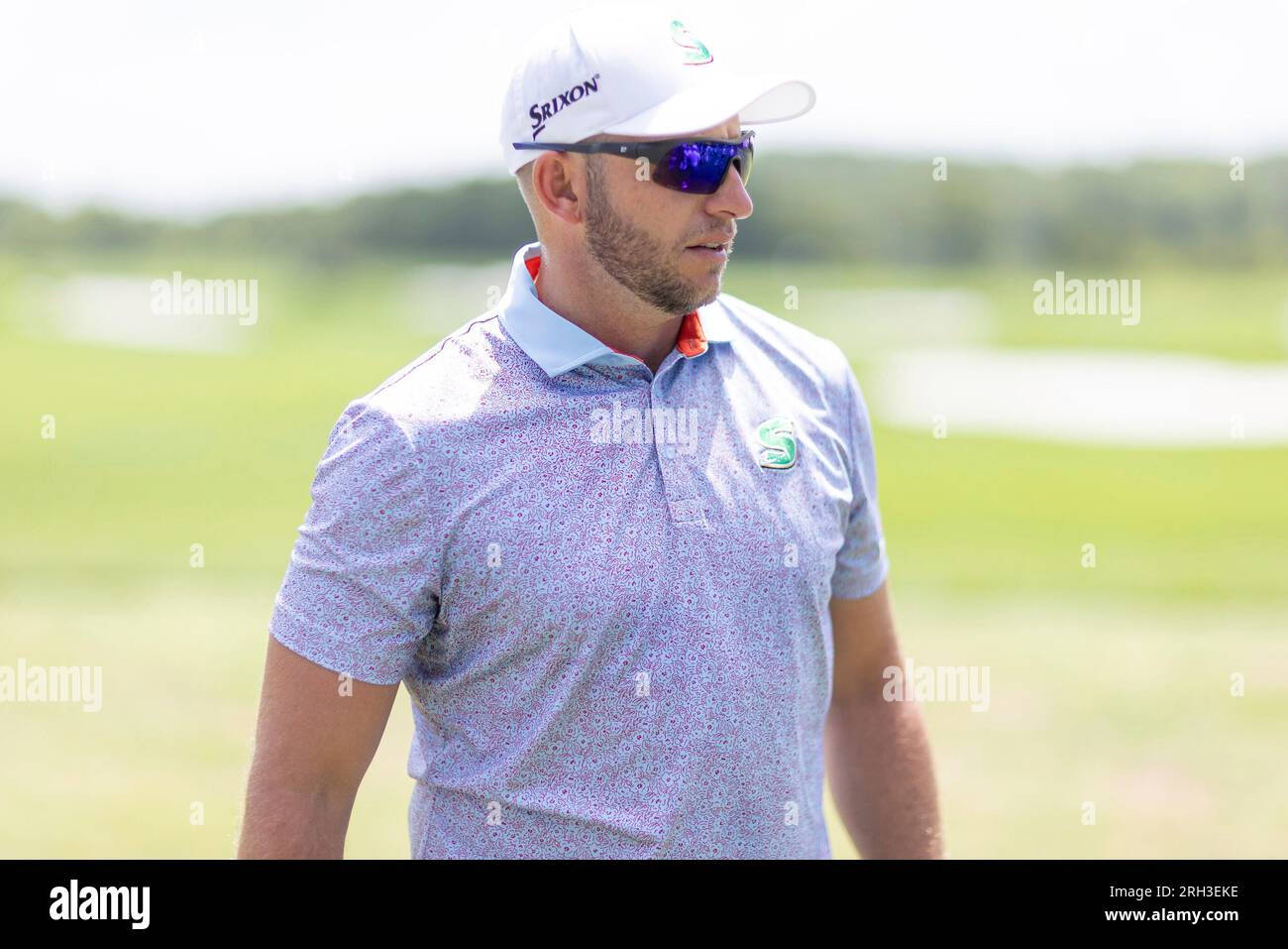 Dean Burmester of Stinger GC looks on from the practice area during the ...