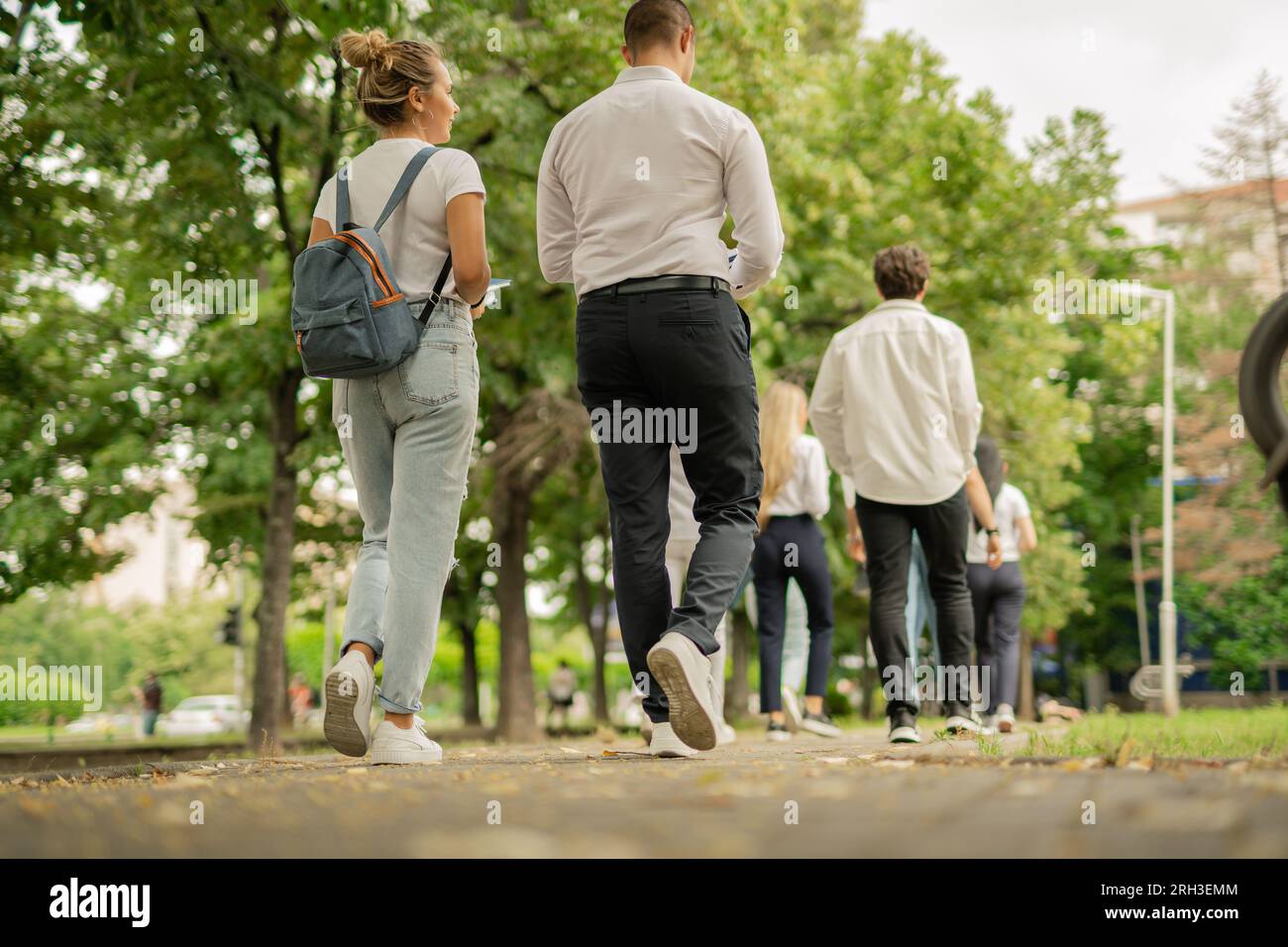 Group of university students getting ready for their class and going to ...