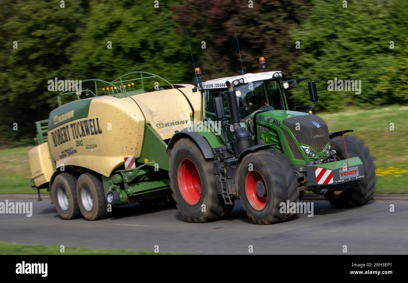 Milton Keynes,UK - Aug 10th 2023: Fendt 986 tractor towing a Krone ... Milton Keynes,UK - Aug 10th 2023: Fendt 986 tractor towing a Krone ...