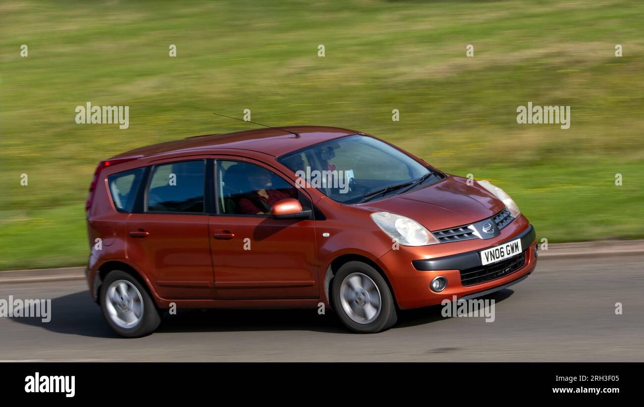 Milton Keynes,UK - Aug 10th 2023: 2006 Nissan Note car driving on an ...