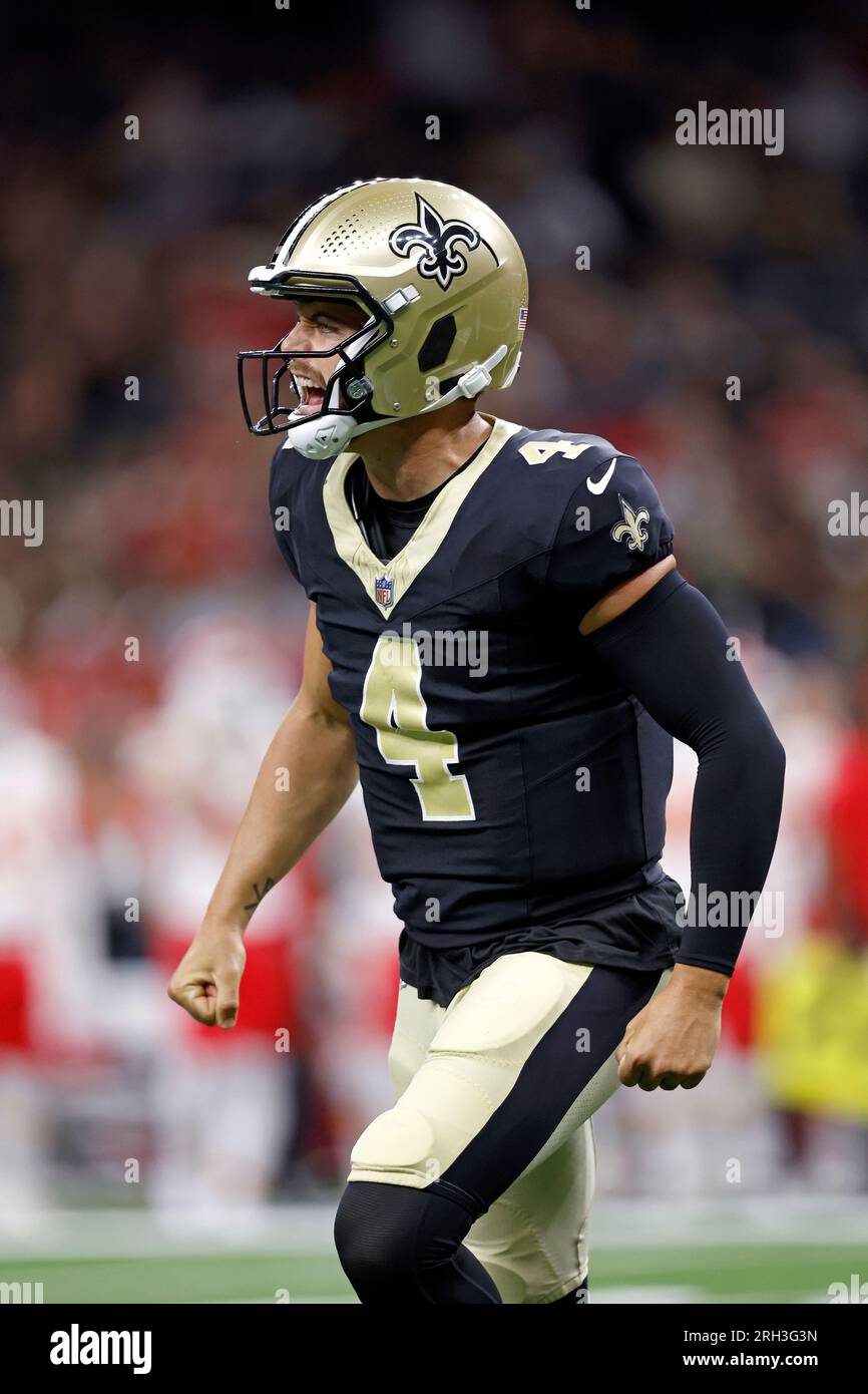 New Orleans Saints quarterback Derek Carr (4) celebrates after throwing ...