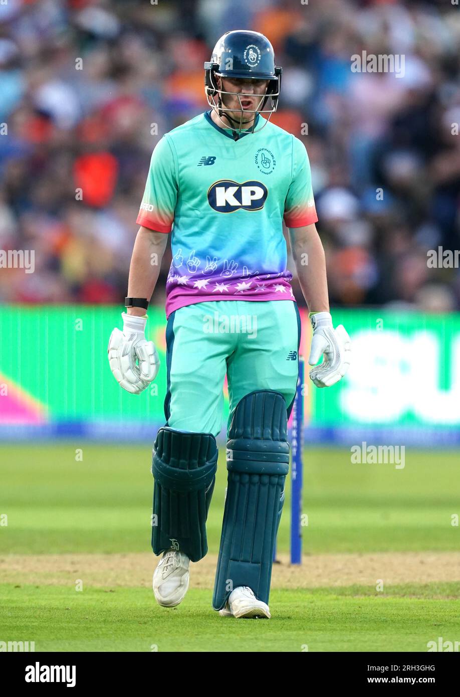 Oval Invincibles' Jordan Cox reacts after being hit in the hand by the ...