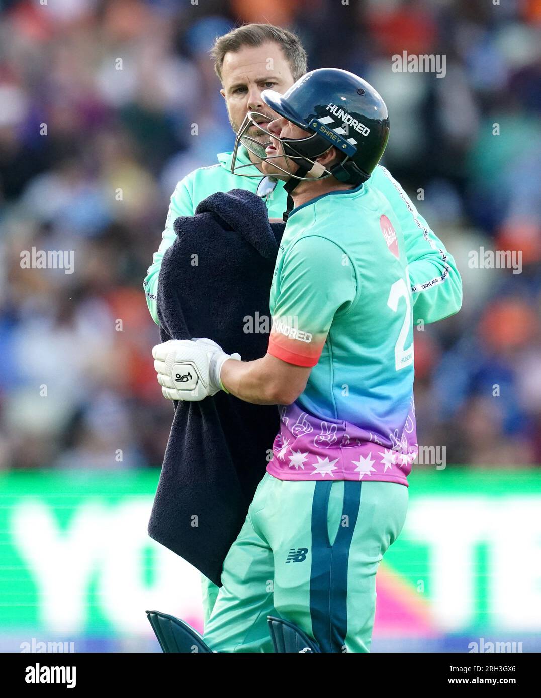 Oval Invincibles' Jordan Cox reacts after being hit in the hand by the ...