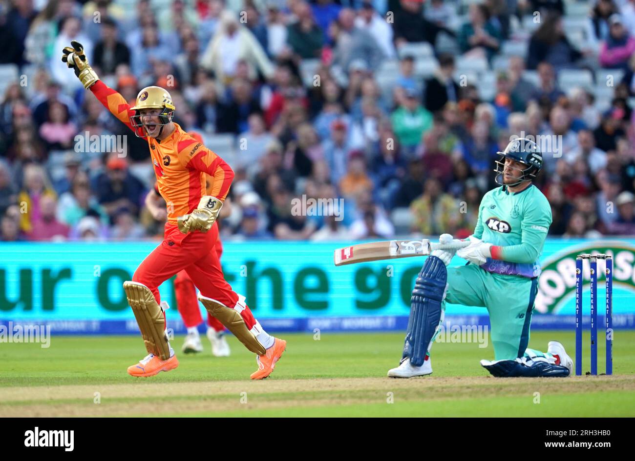 Birmingham Phoenix's Chris Benjamin (left) celebrates catching out Oval ...