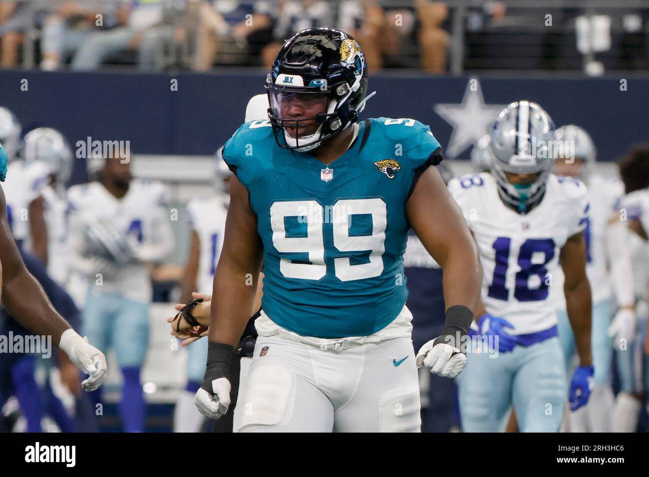 Jacksonville Jaguars defensive end Jeremiah Ledbetter (99) prepares for ...