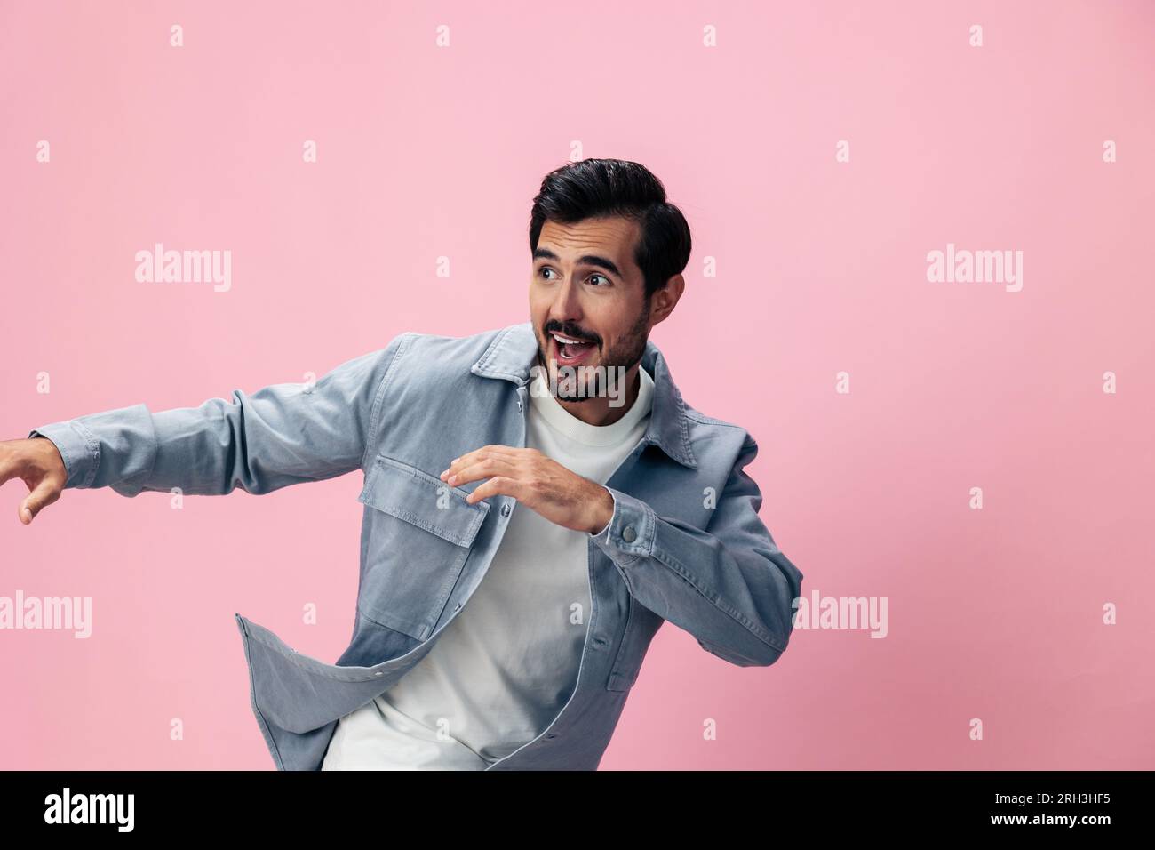 Stylish brunette man with beard happiness open mouth jumping and ...