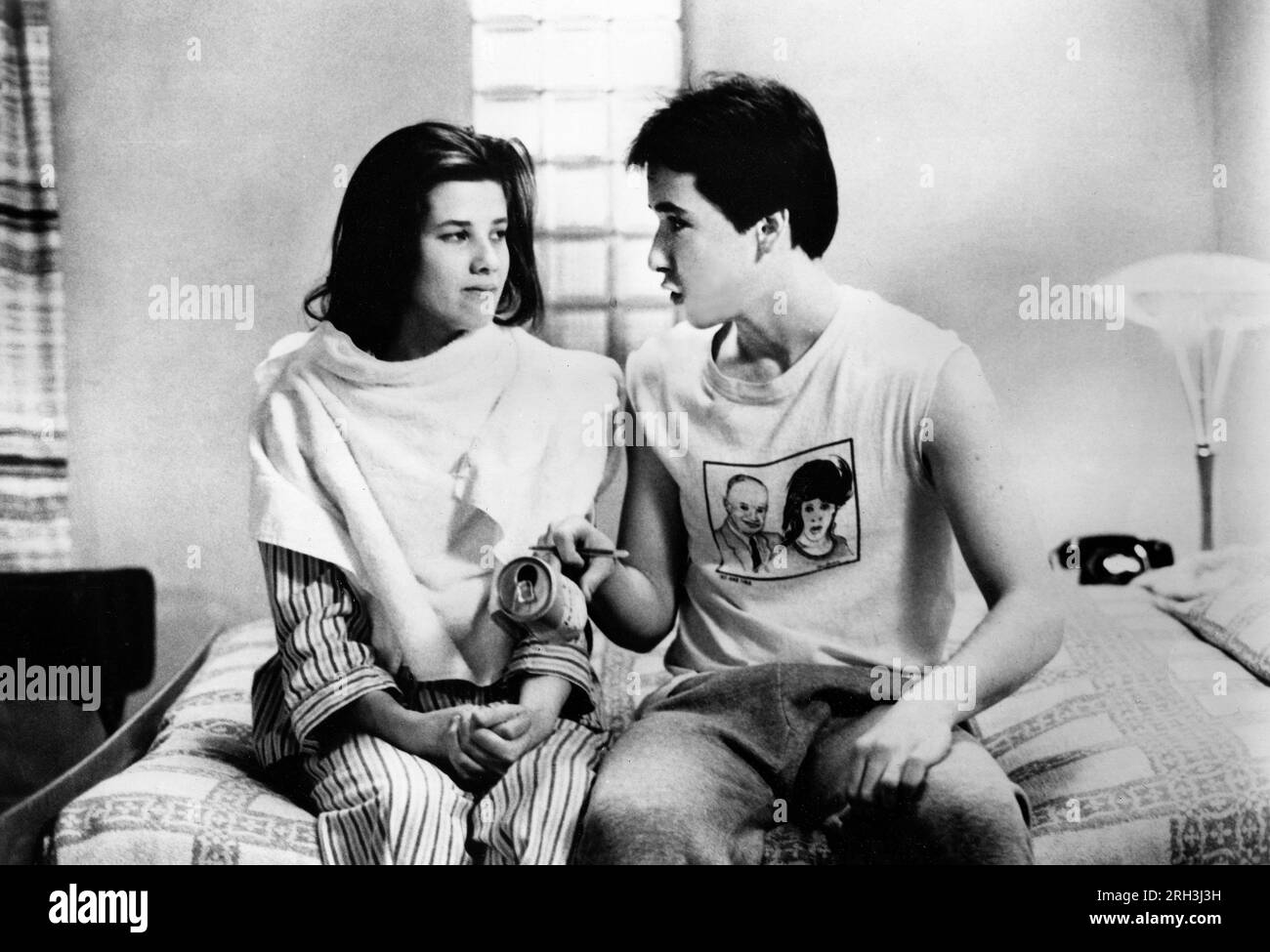 Daphne Zuniga, John Cusack, on-set of the Film, "The Sure Thing ...